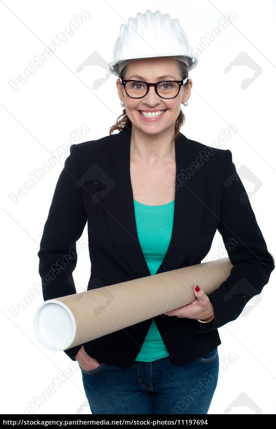Confident female architect carrying blueprints - Stock image ... Confident female architect carrying blueprints - Stock image ...